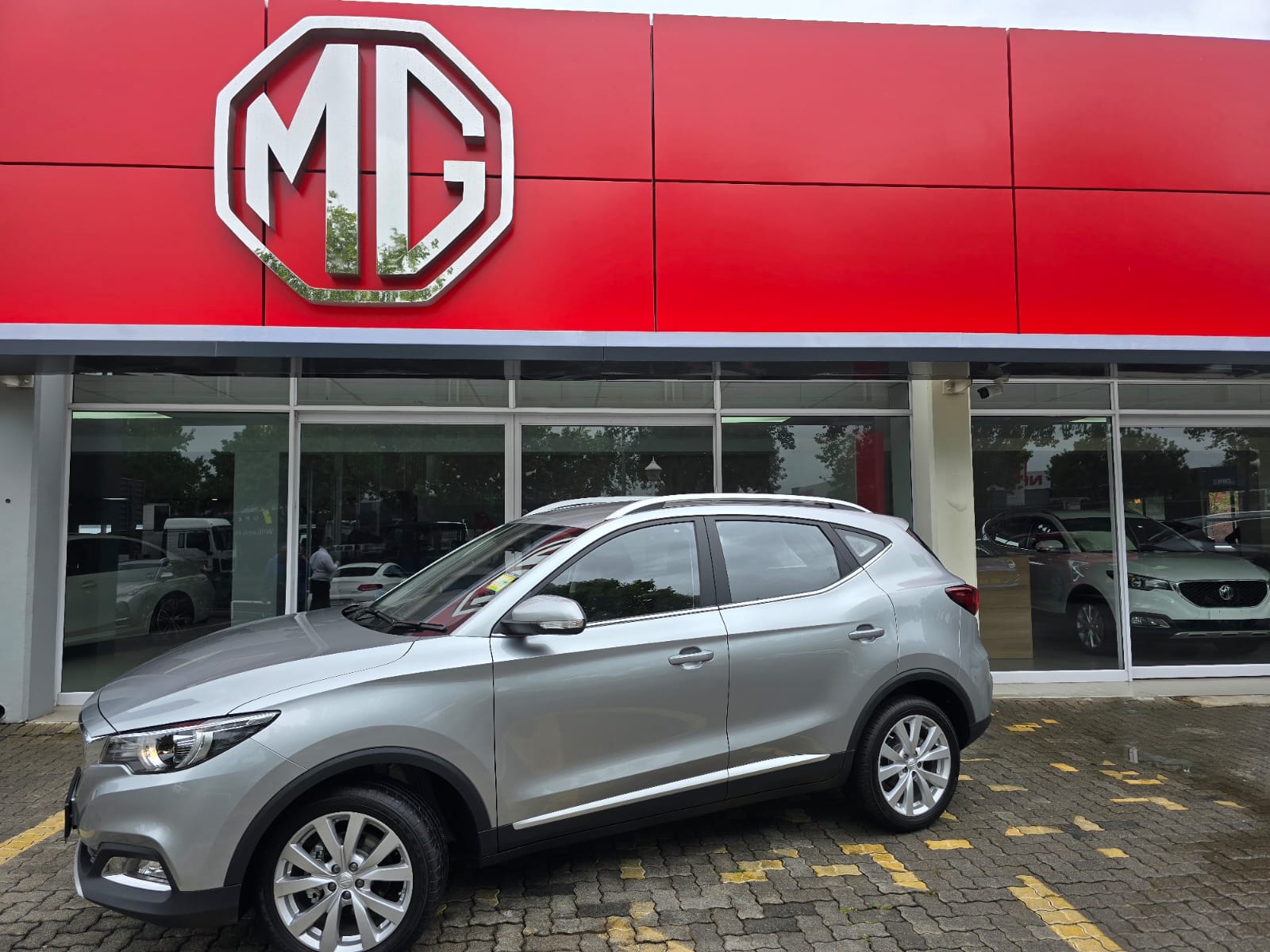 2025 MG ZS 1.5 Com Auto Q2FyTGlzdGluZzo0NTQxNjk R289900 | Avo Auto